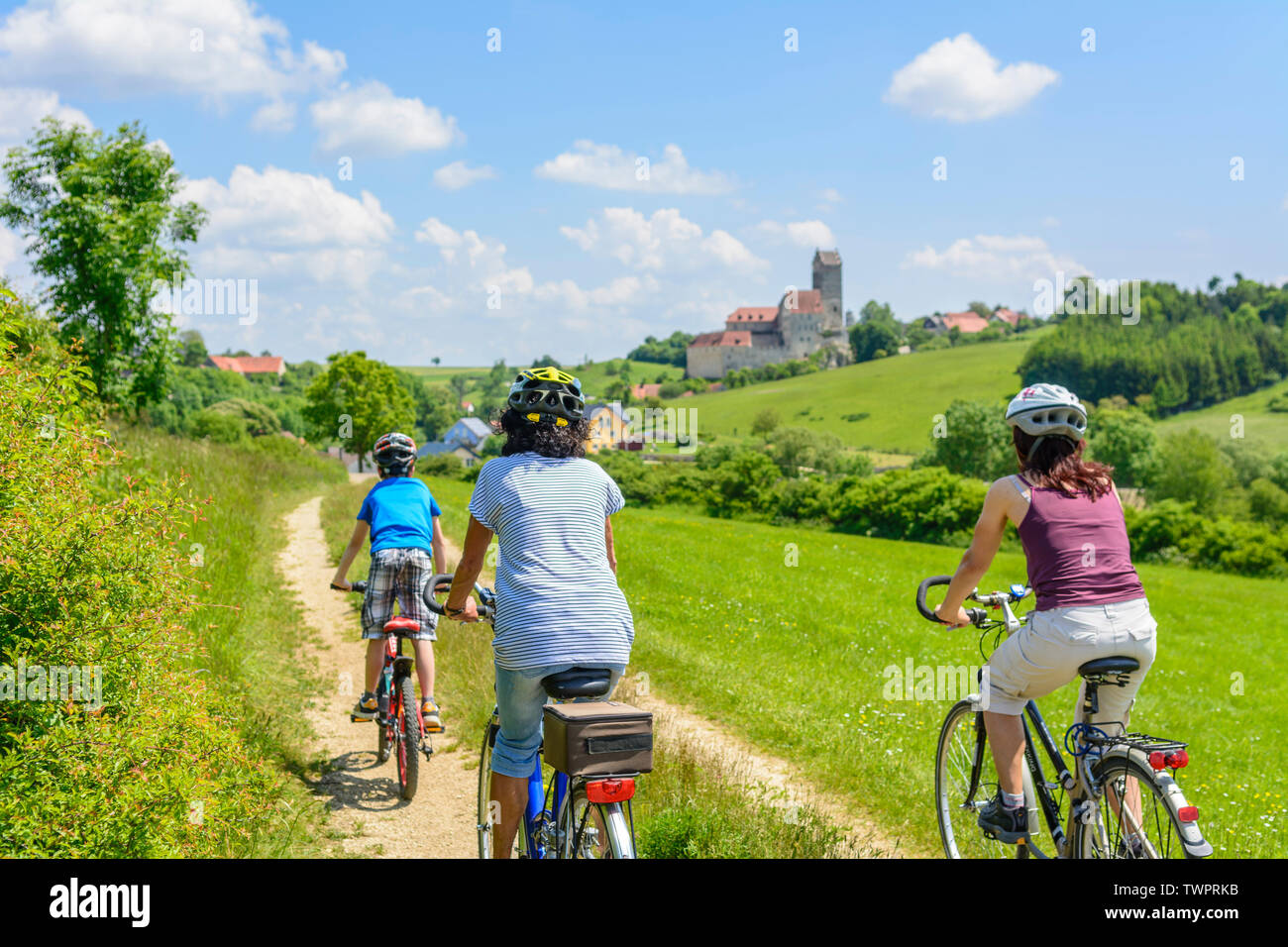 Cycling tour in summertime in rural landscape near Katzenstein in ...