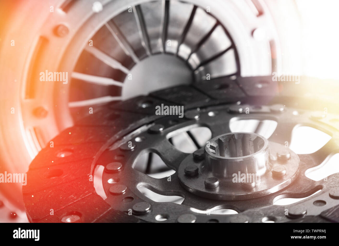 Shot of modern new spare parts for car in the muffled lighting made ...