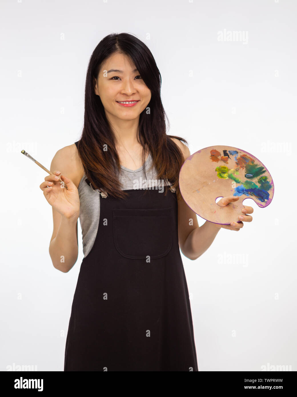 Artist holding painting hi-res stock photography and images - Alamy