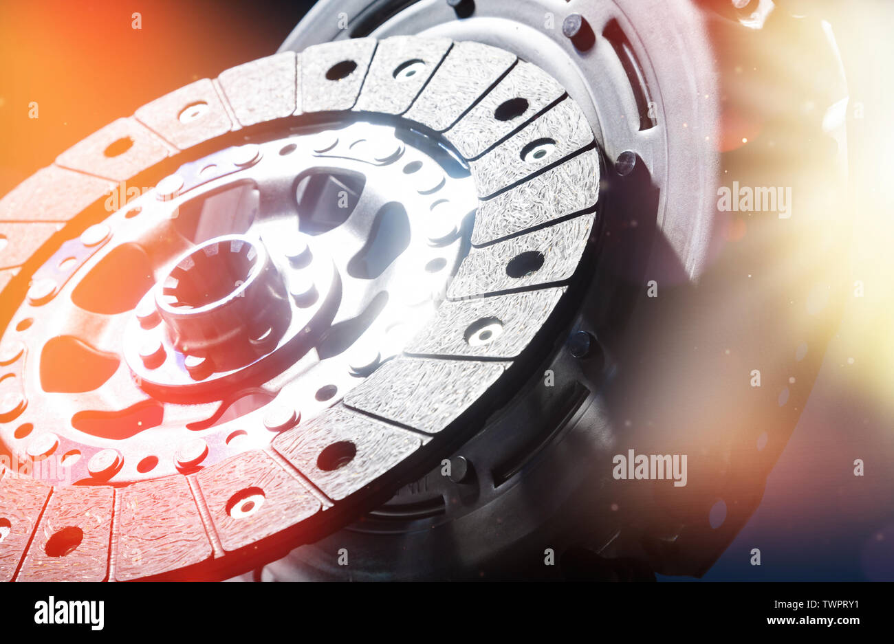 Shot of modern new spare parts for car in the muffled lighting made ...