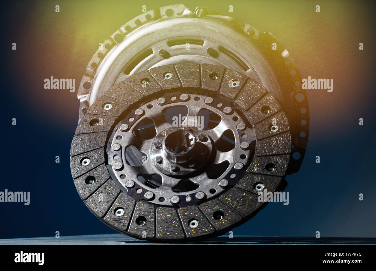 Shot of modern new spare parts for car in the muffled lighting made ...