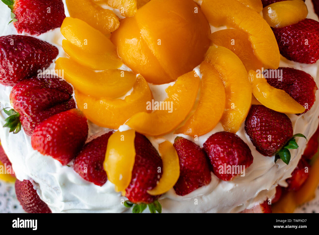 Very sweet cream cake with fruits in detail Stock Photo - Alamy