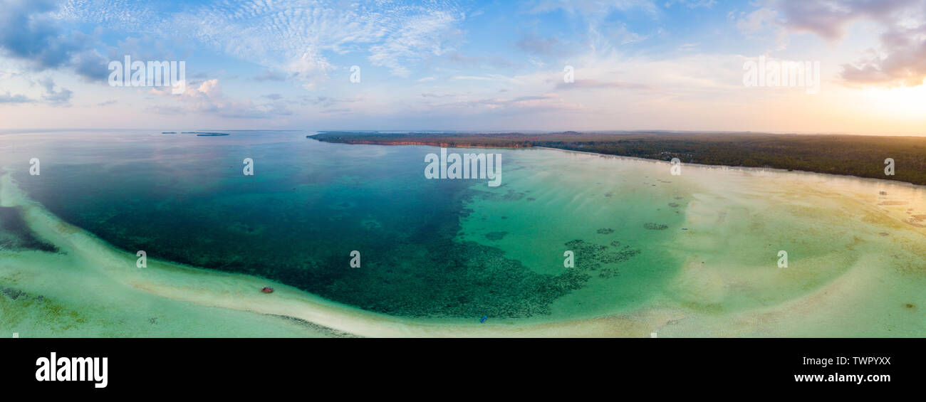 Aerial view tropical beach island reef caribbean sea dramatic sky at ...