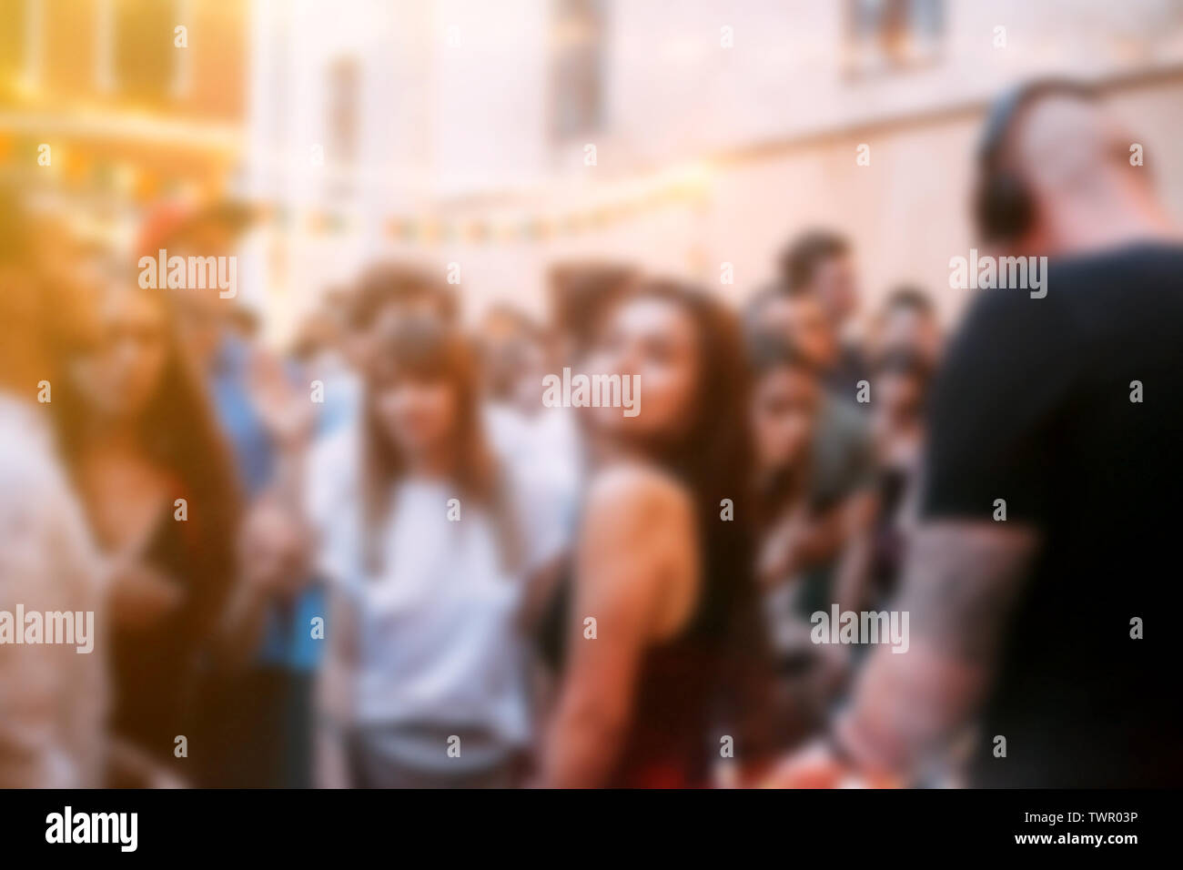 Outdoor party blurred dancing people background. Festive summer event ...