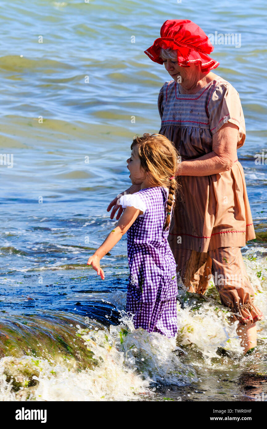 Woman victorian bathing costume hi-res stock photography and images - Alamy