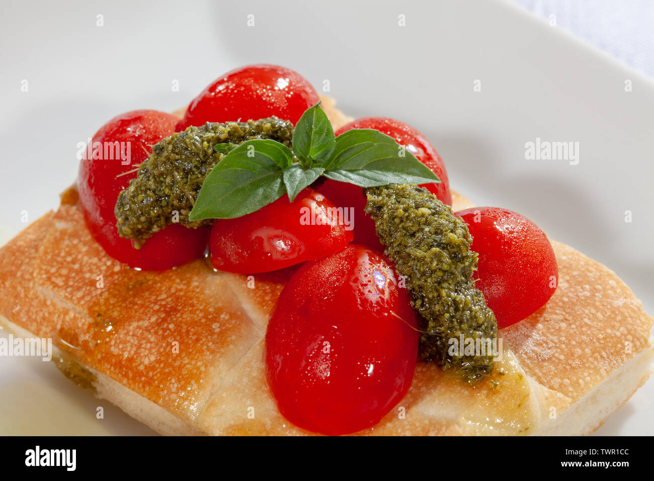 finger food aubergine salad tomatoes onion bread salami slices green ...