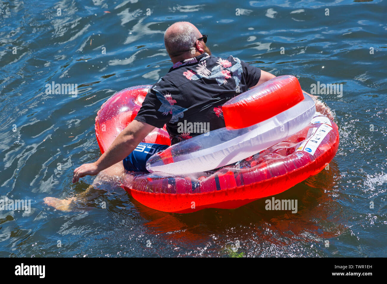 Man dinghy back view hi-res stock photography and images - Alamy