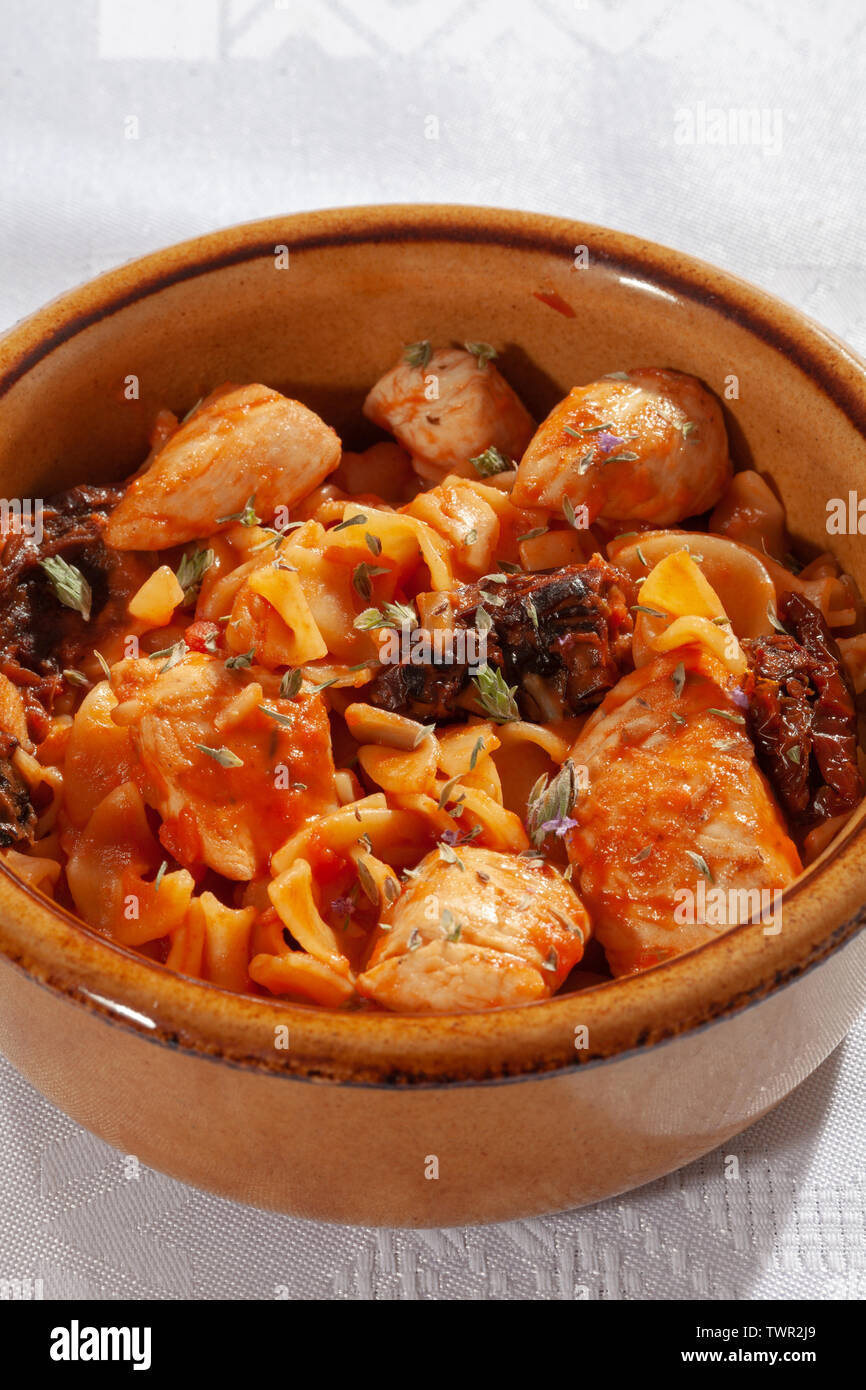 chicken meat pieces and barley cooked and served with parsley ...