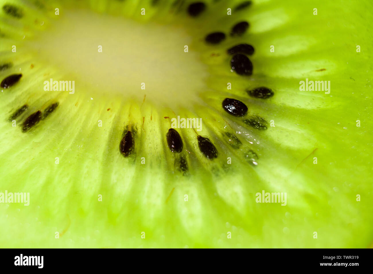 ASHTON-U-LYNE, UK. 23 Feb 2015. A piece of kiwifruit (also known as ...