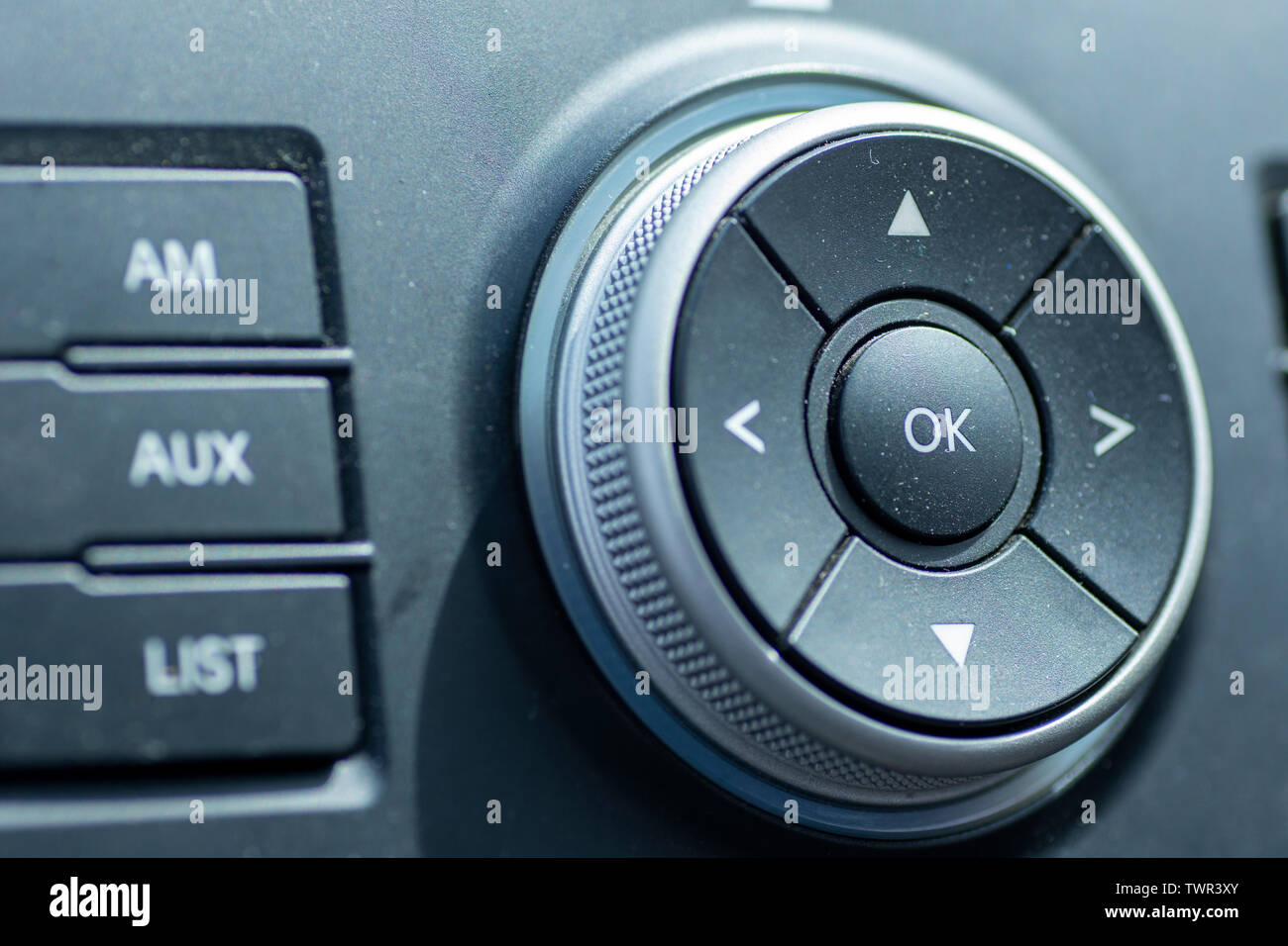 Dial for controlling entertainment system on car dashboard Stock Photo ...