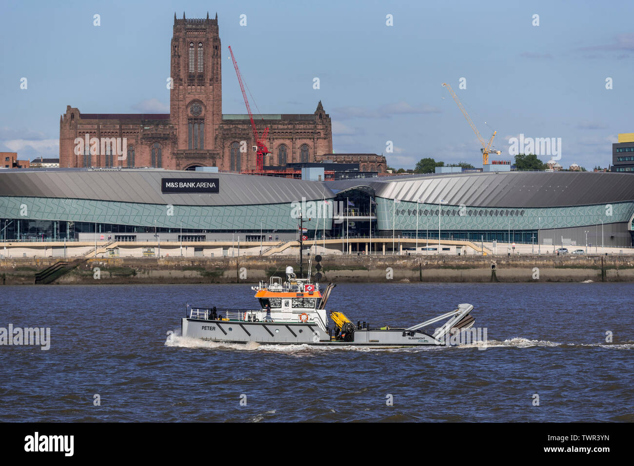 Dutch tug and plough dredger named Peter in the river Mersey at ...
