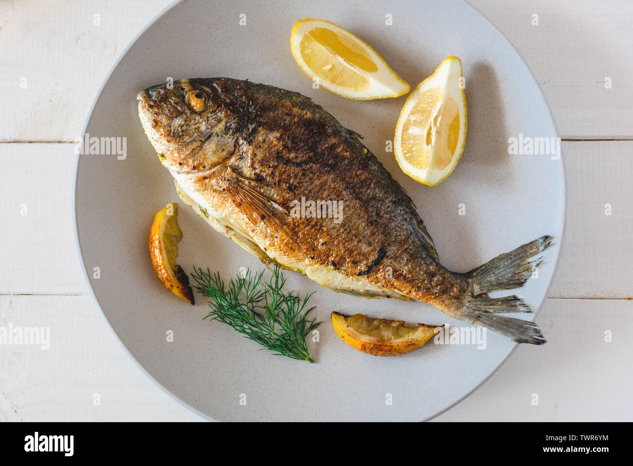 Plate grilled dorado fish hi-res stock photography and images - Alamy