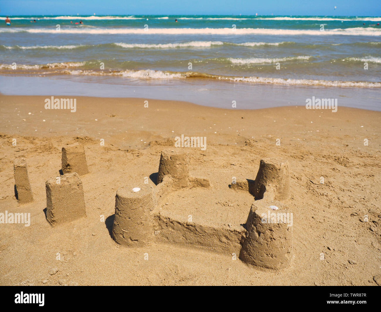 Sand castle or sandcastle on the beach at sea Stock Photo - Alamy