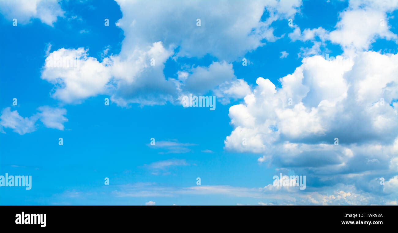 Blue sky background with clouds in clear day Stock Photo - Alamy