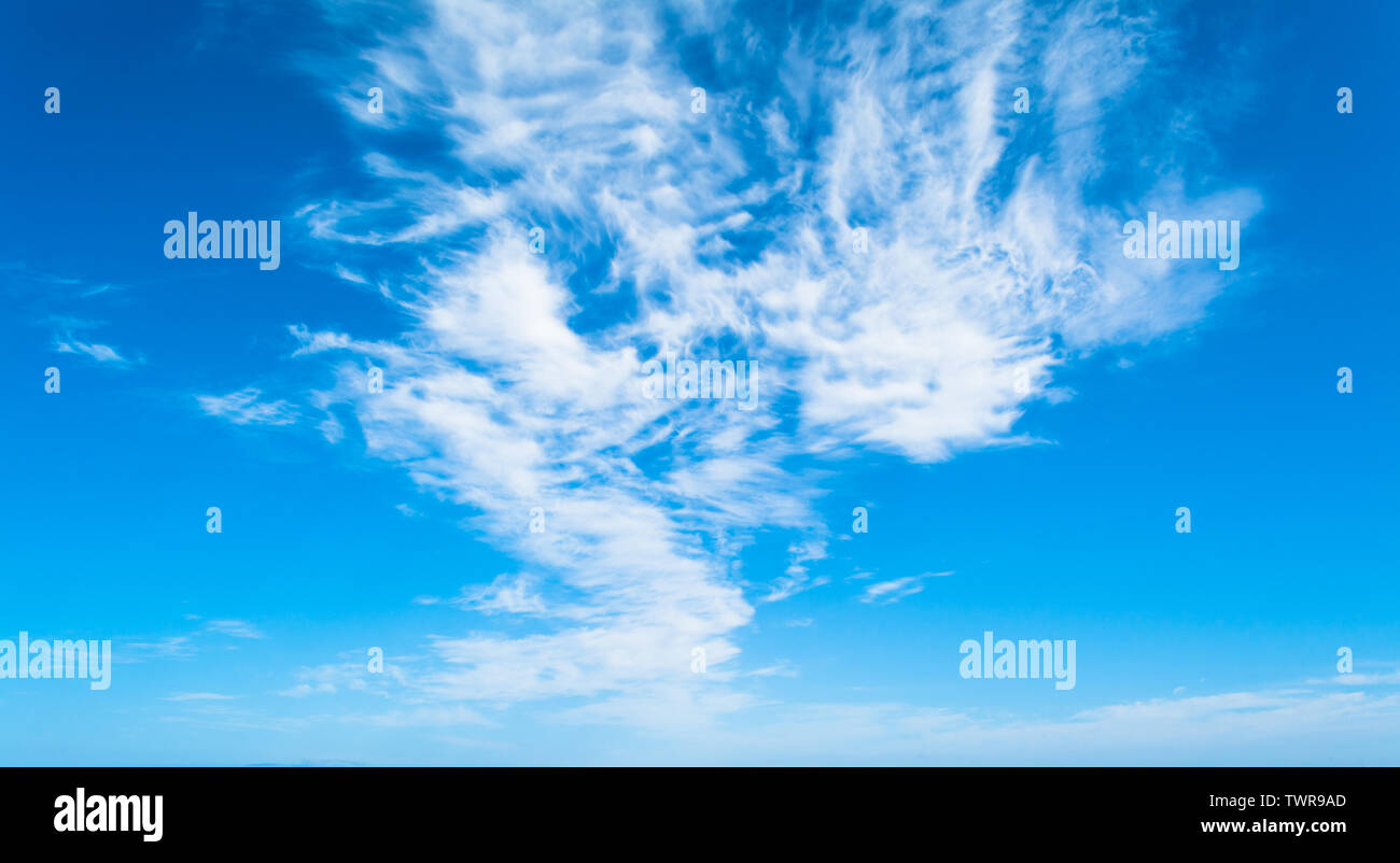 Blue sky background with clouds in clear day Stock Photo - Alamy