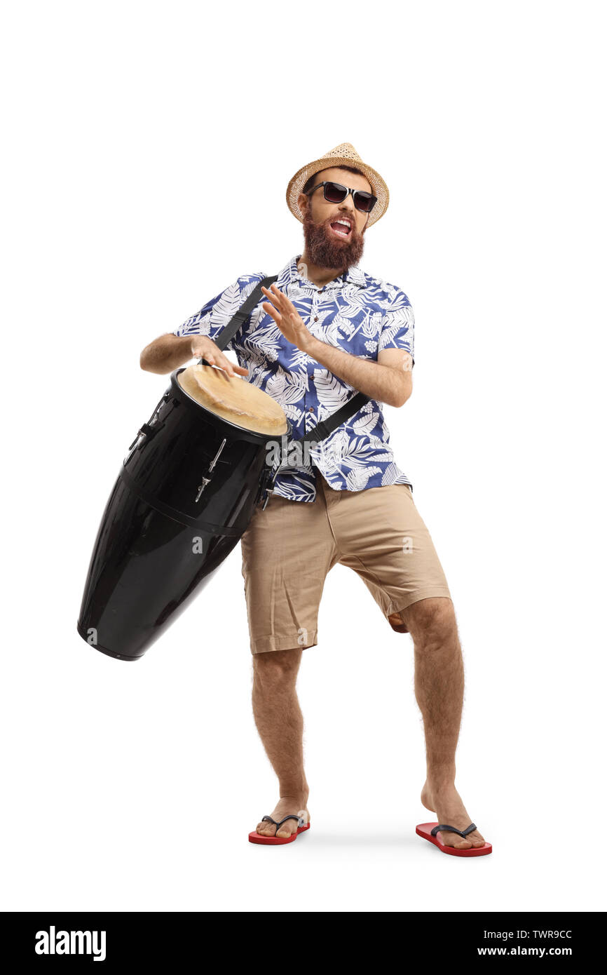 Full length portrait of a bearded young man playing conga drums ...