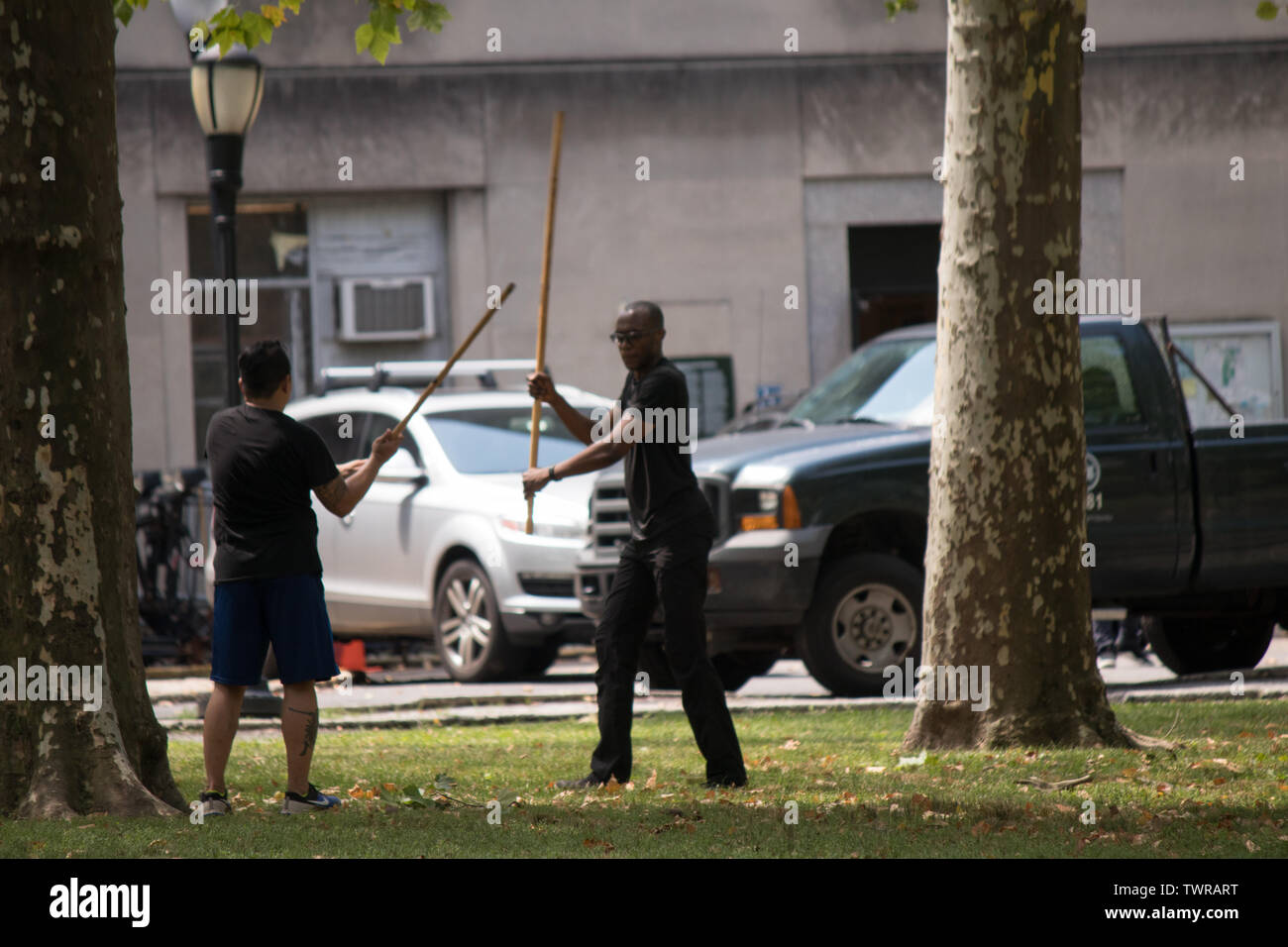 Men Fighting With Sticks High Resolution Stock Photography and Images ...