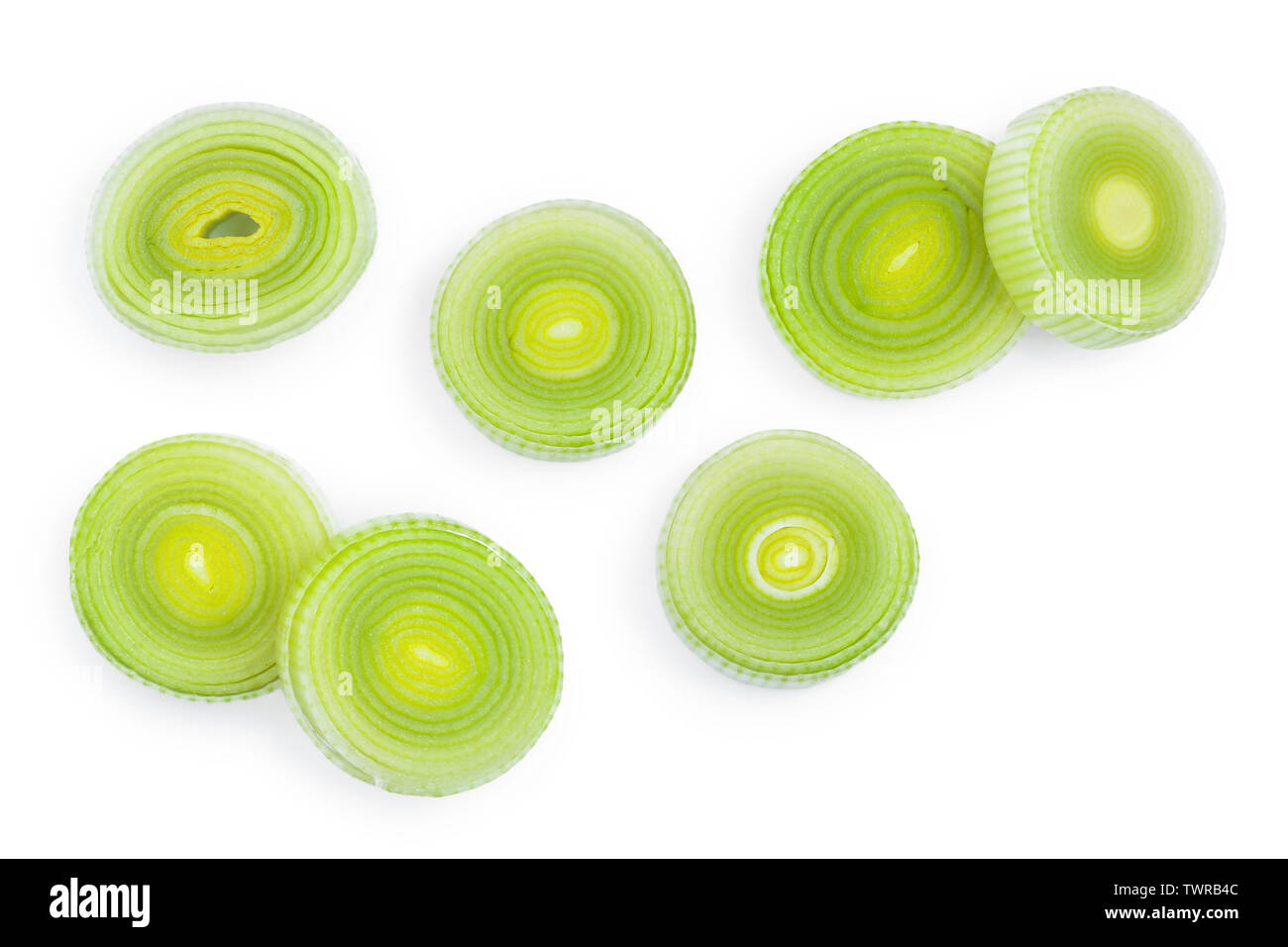 sliced Leek vegetable isolated on white background. Top view. Flat lay ...