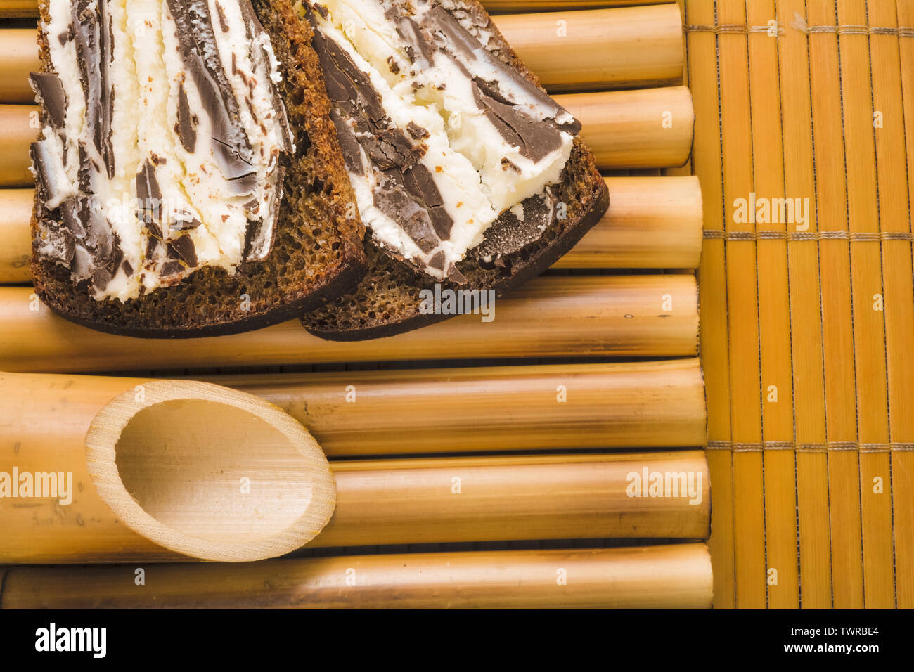 Sandwich with coarse black grain bread and sweet curd and dark ...