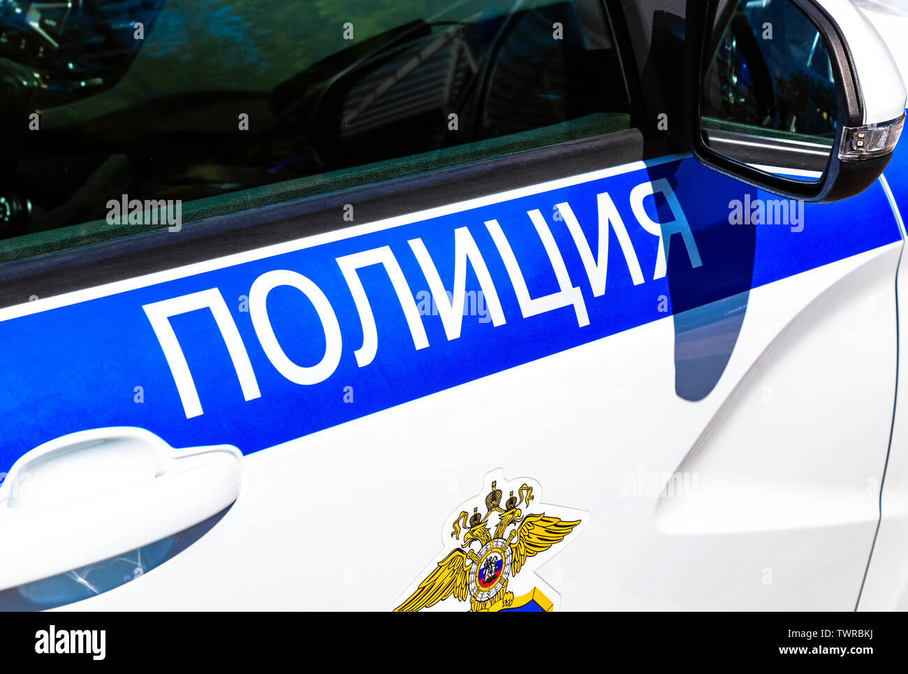 Inscription "Police" on the board of russian police vehicle. Police ...