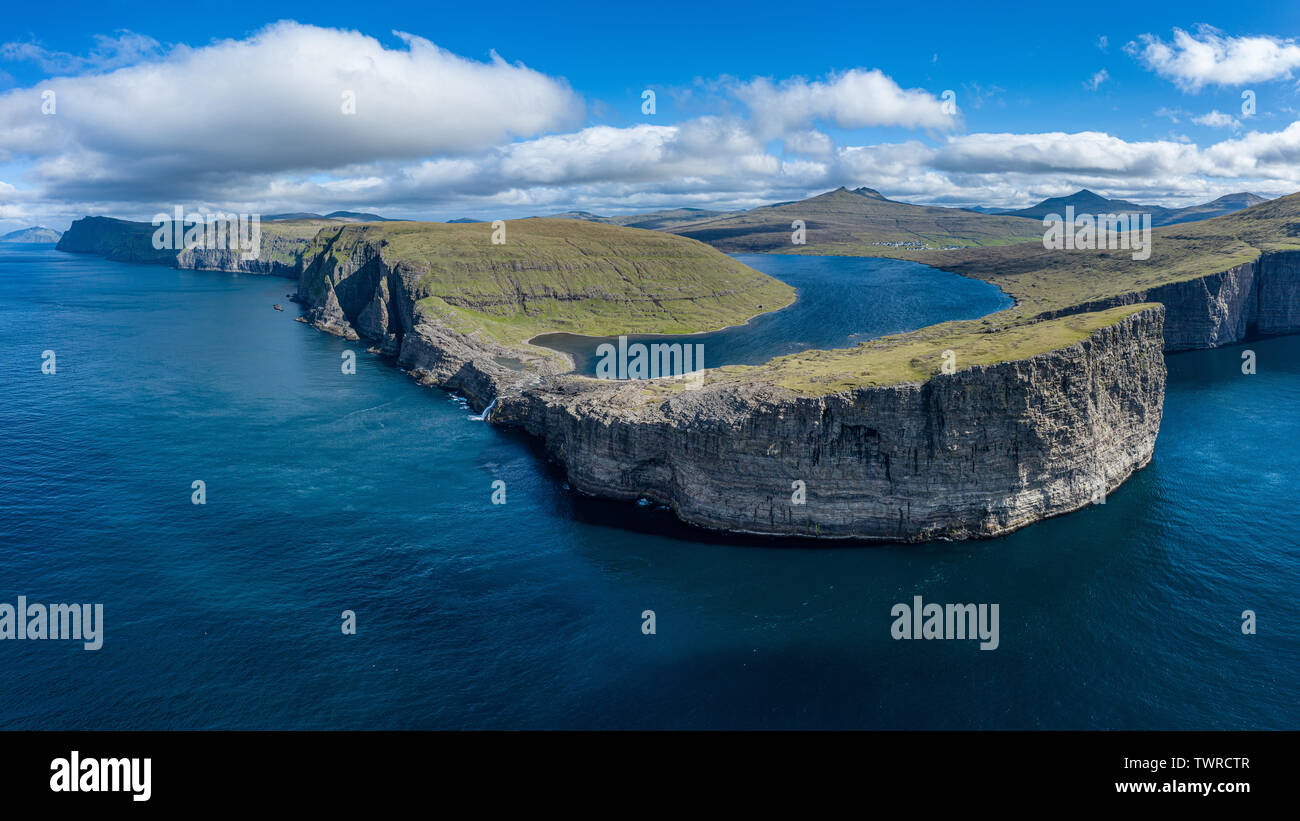 Bosdalafossur waterfall and Sorvagsvatn lake on Vagar island coastline ...