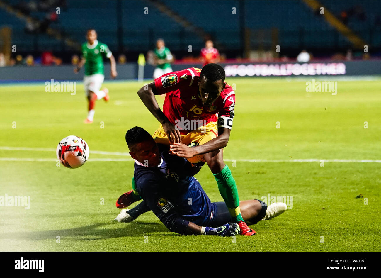 Alexandria, Egypt. 22nd June, 2019. Ibrahima Traore of Guinea tryng to ...