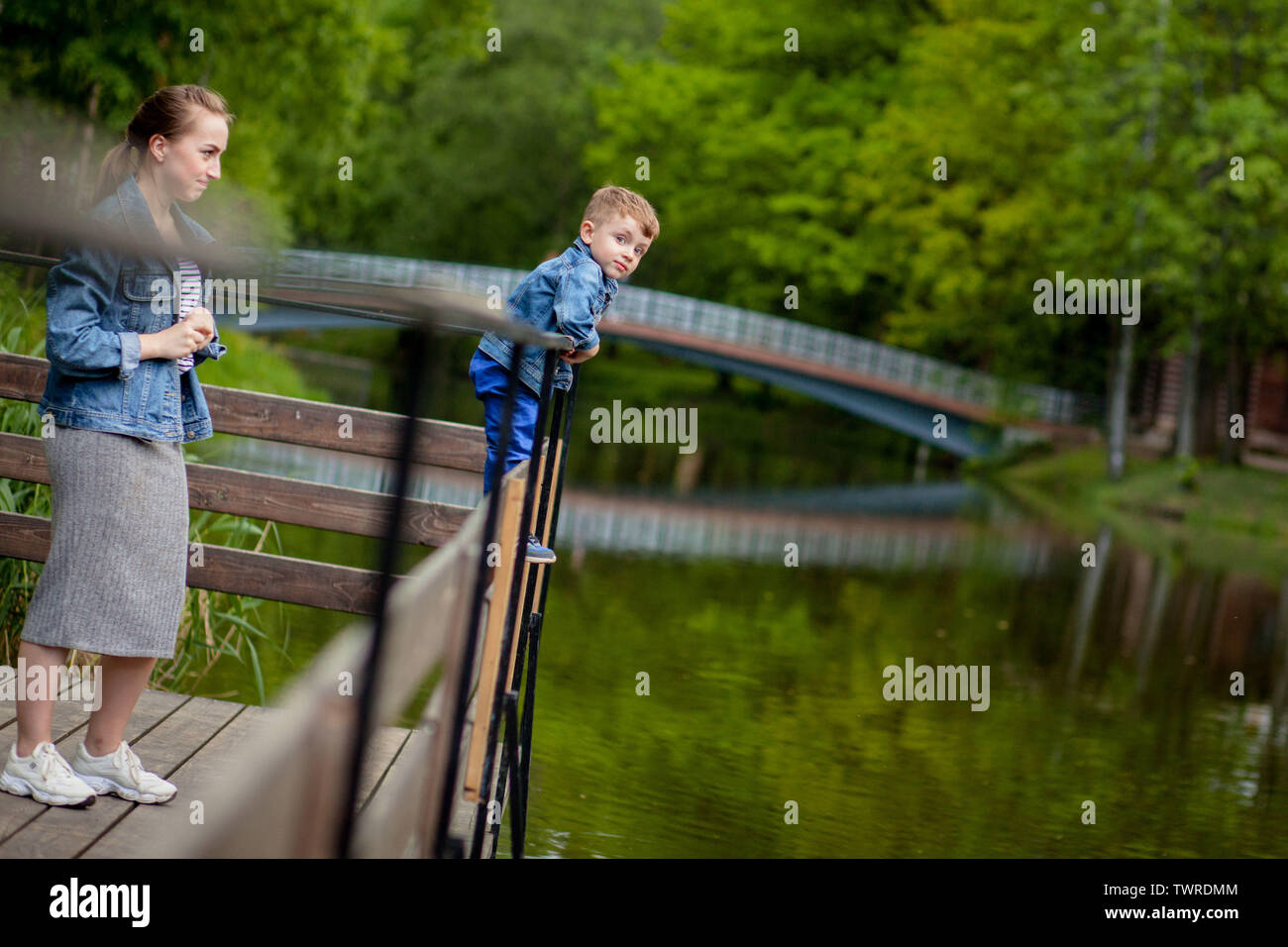Mother is experiencing that the child will fall into the water. A ...