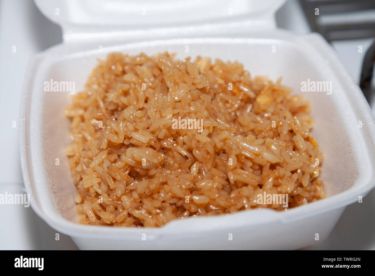 Stir fried rice in a small carryout box Stock Photo - Alamy