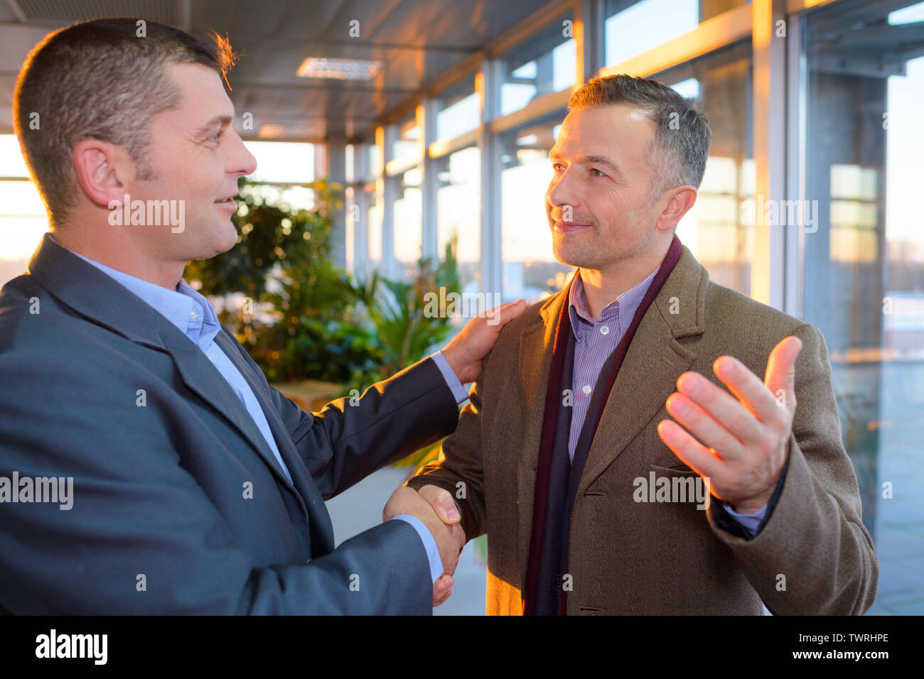 business partnership greating Stock Photo - Alamy