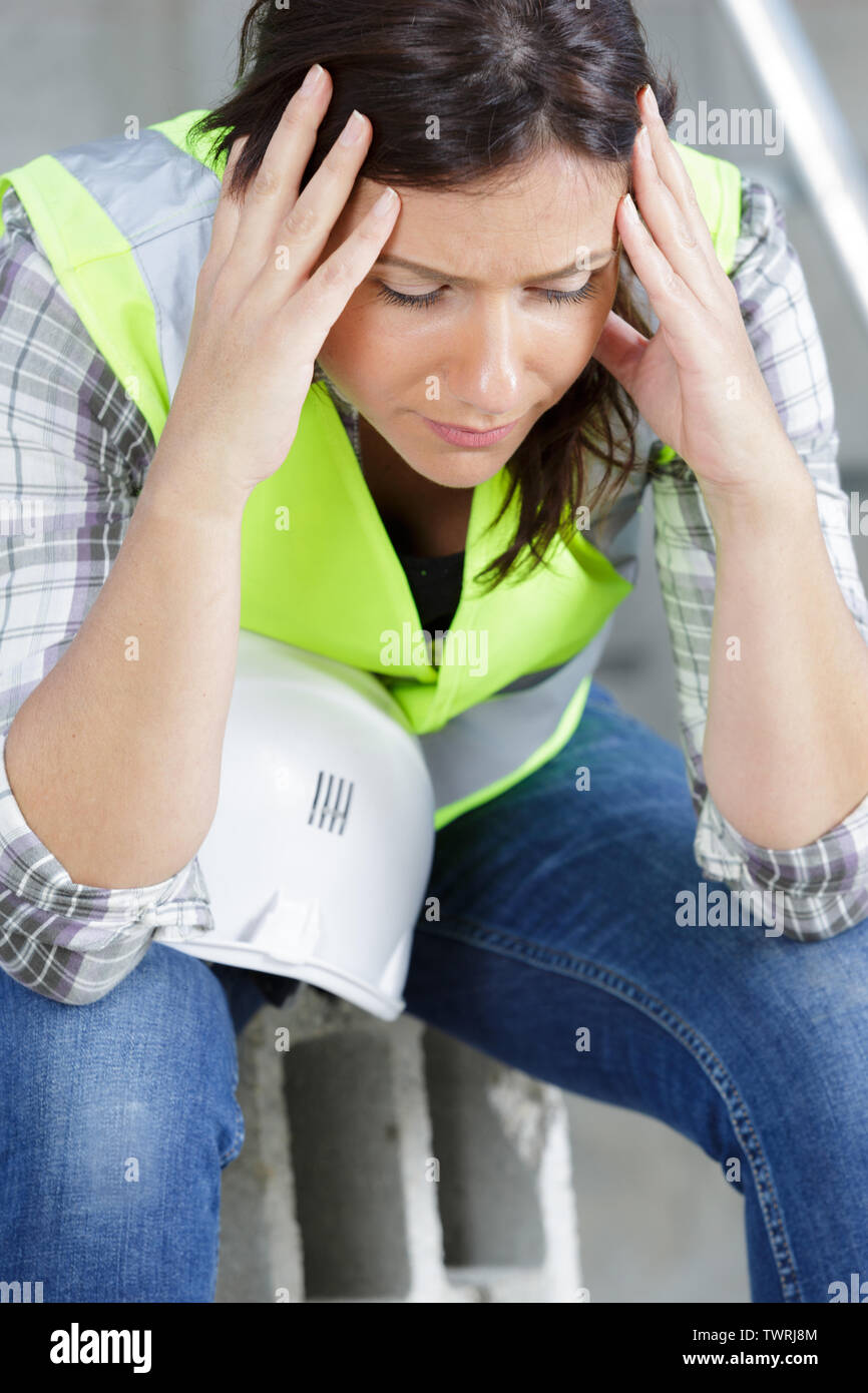 young female engineer suffering headache Stock Photo - Alamy