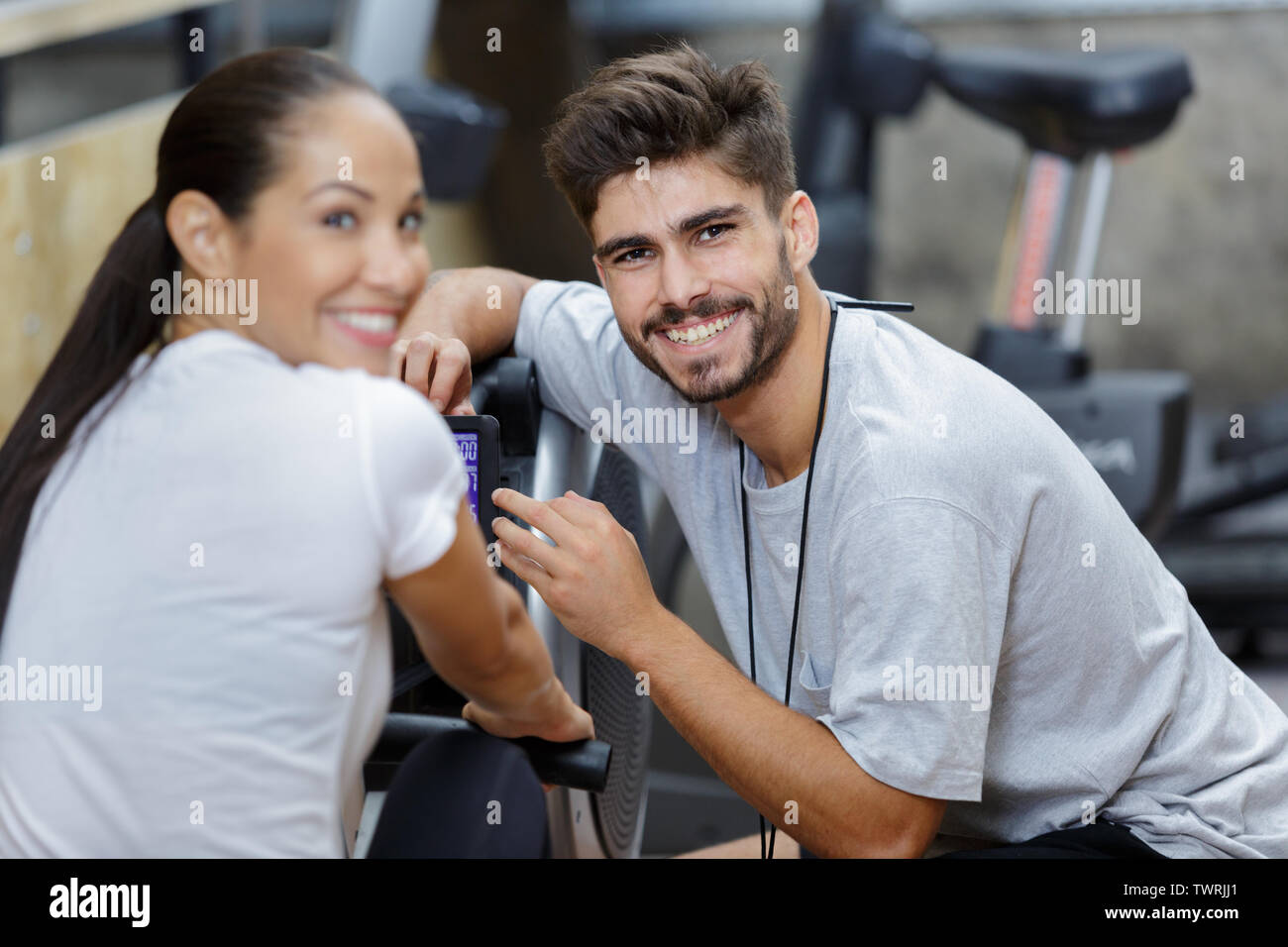 Fit muscular man using rowing hi-res stock photography and images - Alamy