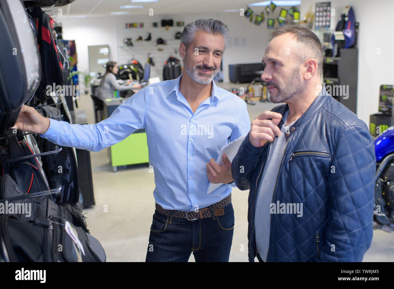 men at a motorbike shop Stock Photo - Alamy