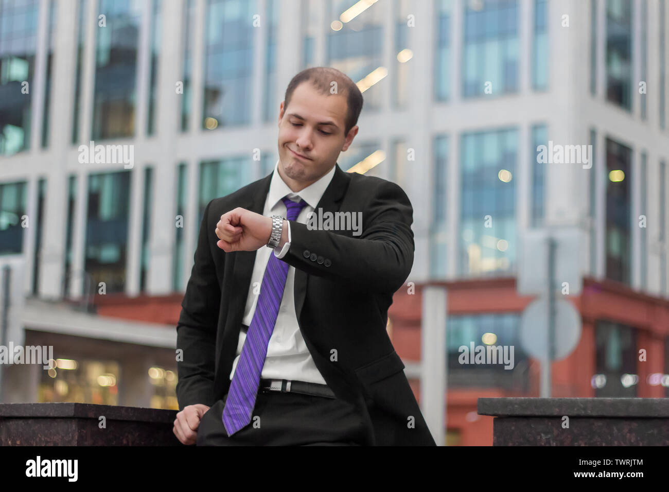 Angry man pointing watch hi-res stock photography and images - Alamy