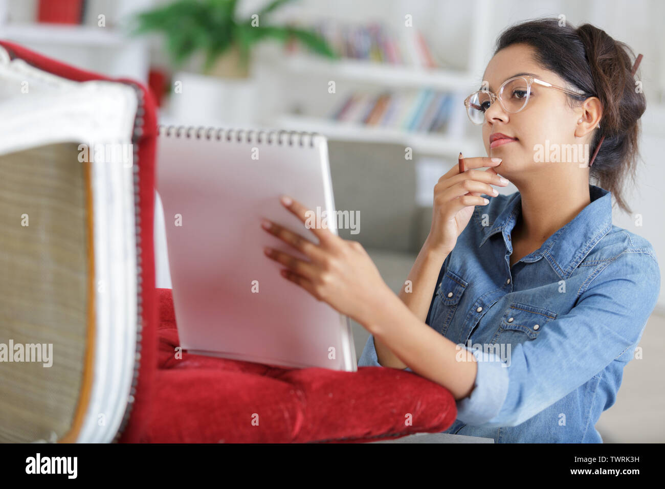 attractive woman taking notes Stock Photo - Alamy