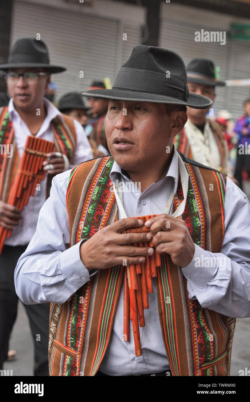 Kollasuyo man playing a siku (panpipe) at the Gran Poder Festival, La ...