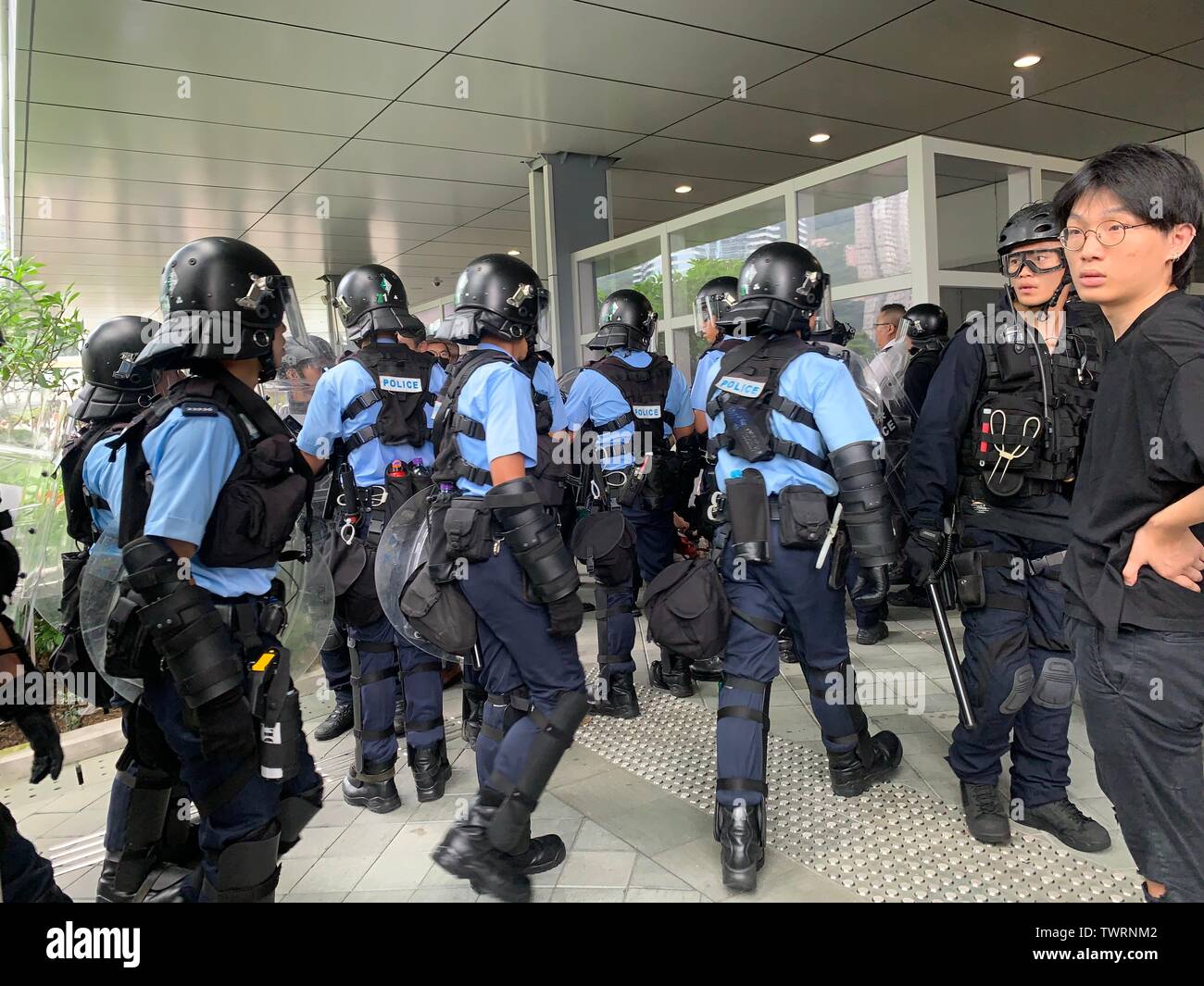 Hong Kong -July 1 2019: riot police guide in the square after Central ...