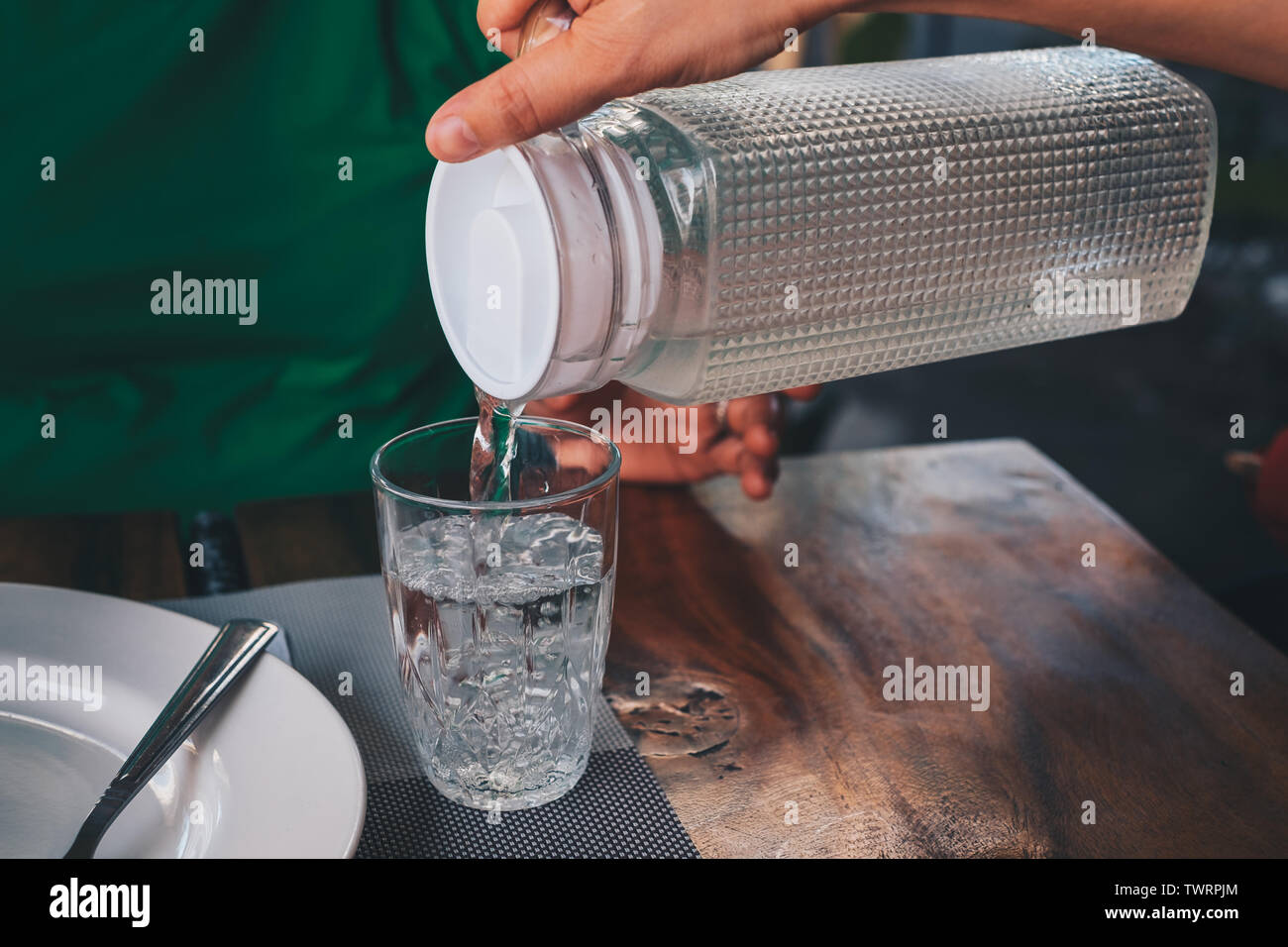 Pouring from pitcher hi-res stock photography and images - Alamy