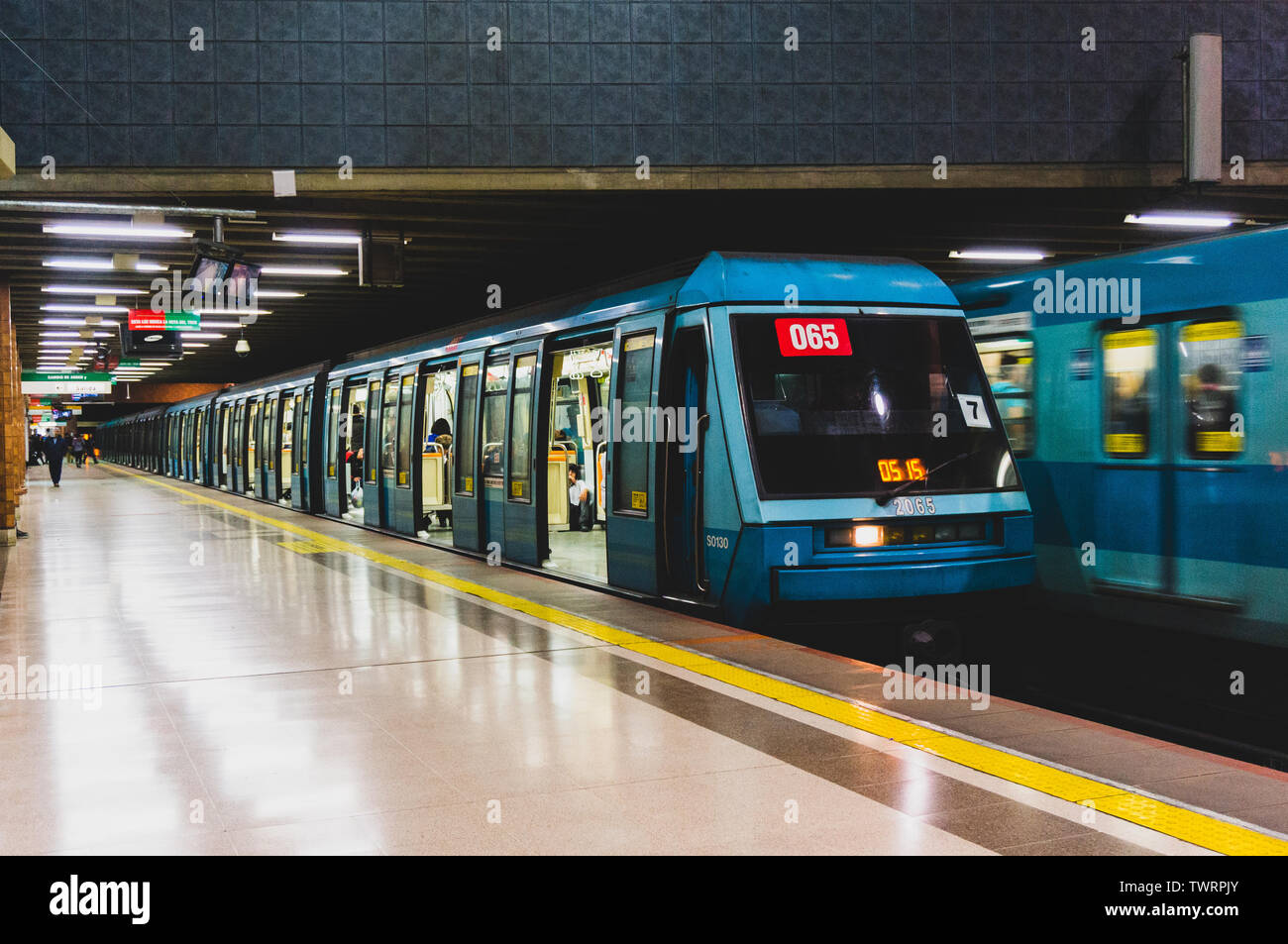 SANTIAGO, CHILE - JULY 2015: Two Metro de Santiago trains at Santa Ana ...