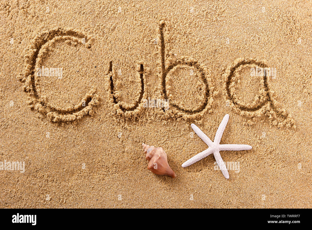 Cuba beach word sign written in sand Stock Photo - Alamy