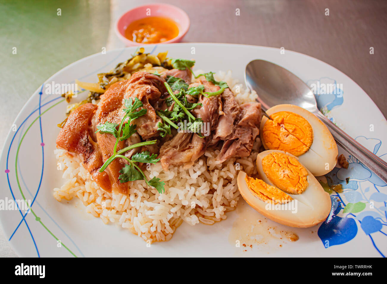 Stewed pork leg on rice serve with egg boil, street food thai style ...