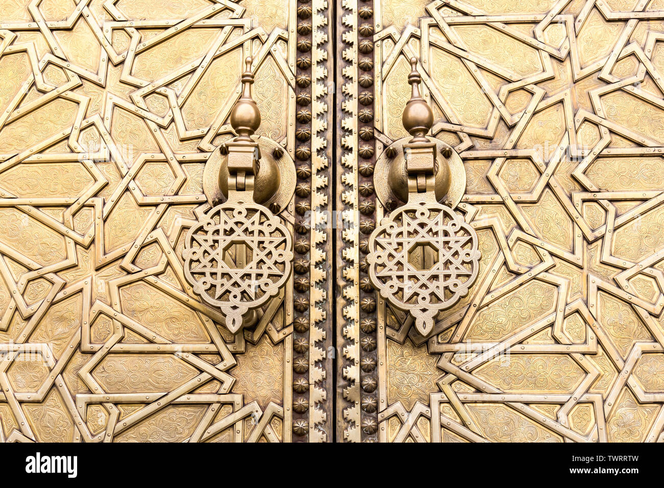 Big golden doors of the royal palace of Fes, Morocco. Design, luxury ...