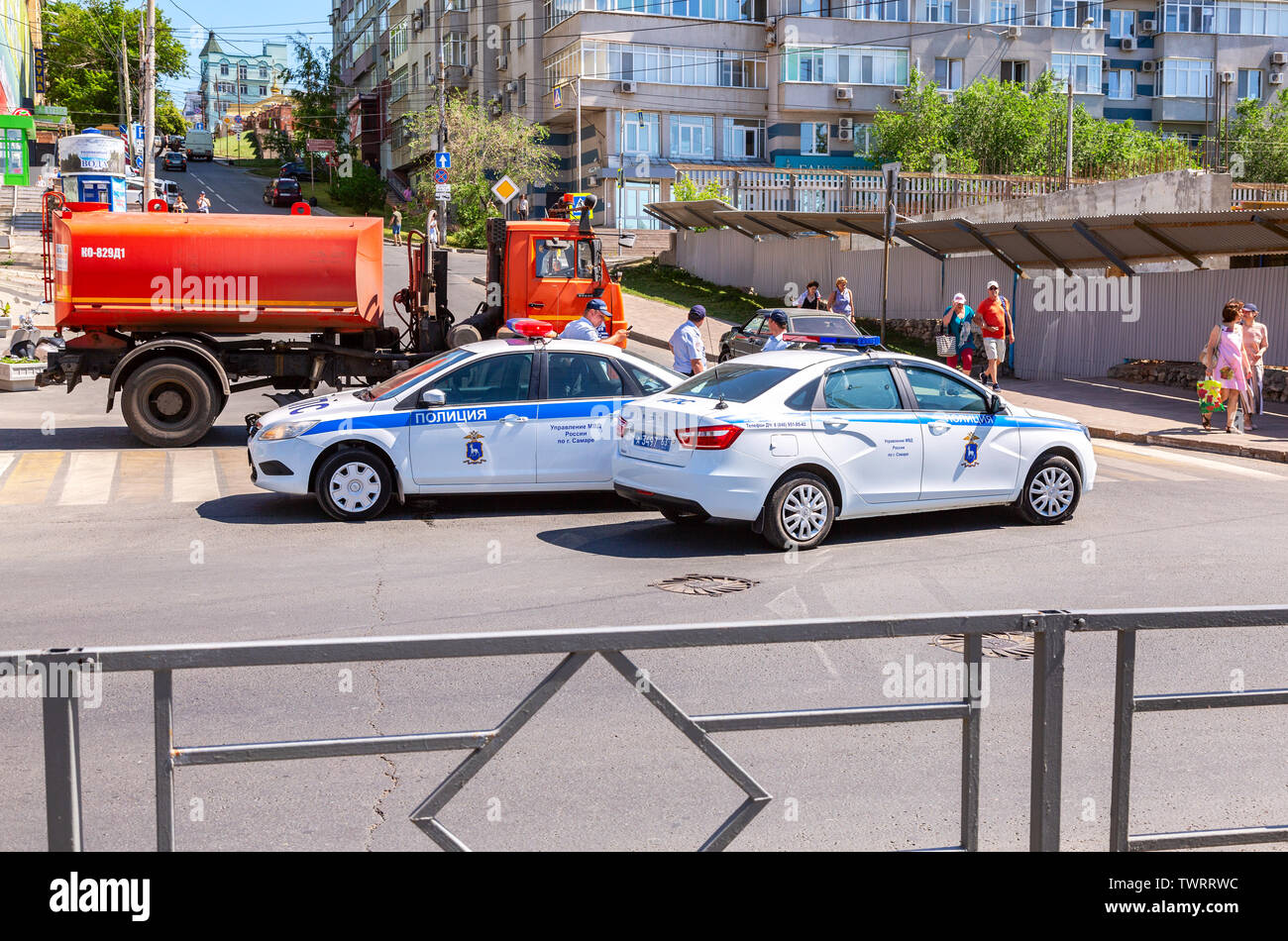 Samara, Russia - June 12, 2019: Heavy trucks Kamaz and police vehicles ...