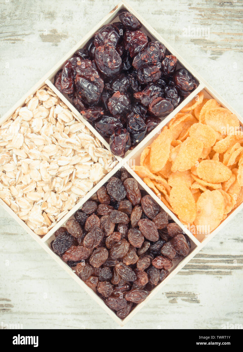 Vintage photo, Dried fruits with various flakes as source carbohydrates ...