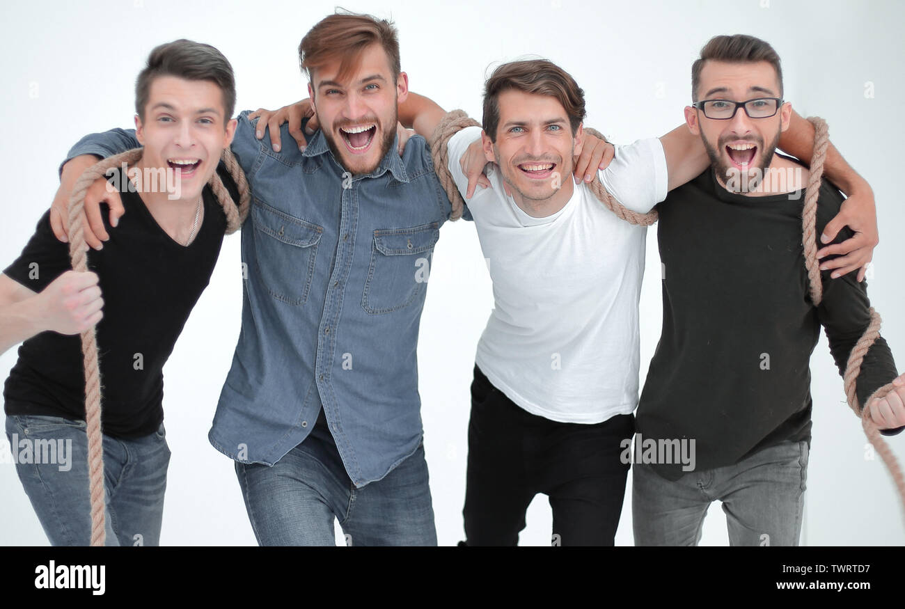 team of friends holding a strong rope Stock Photo - Alamy