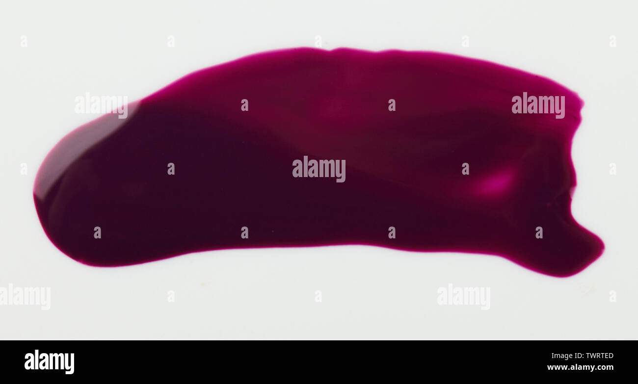 Deep red paint stroke isolated on white background close up view Stock ...