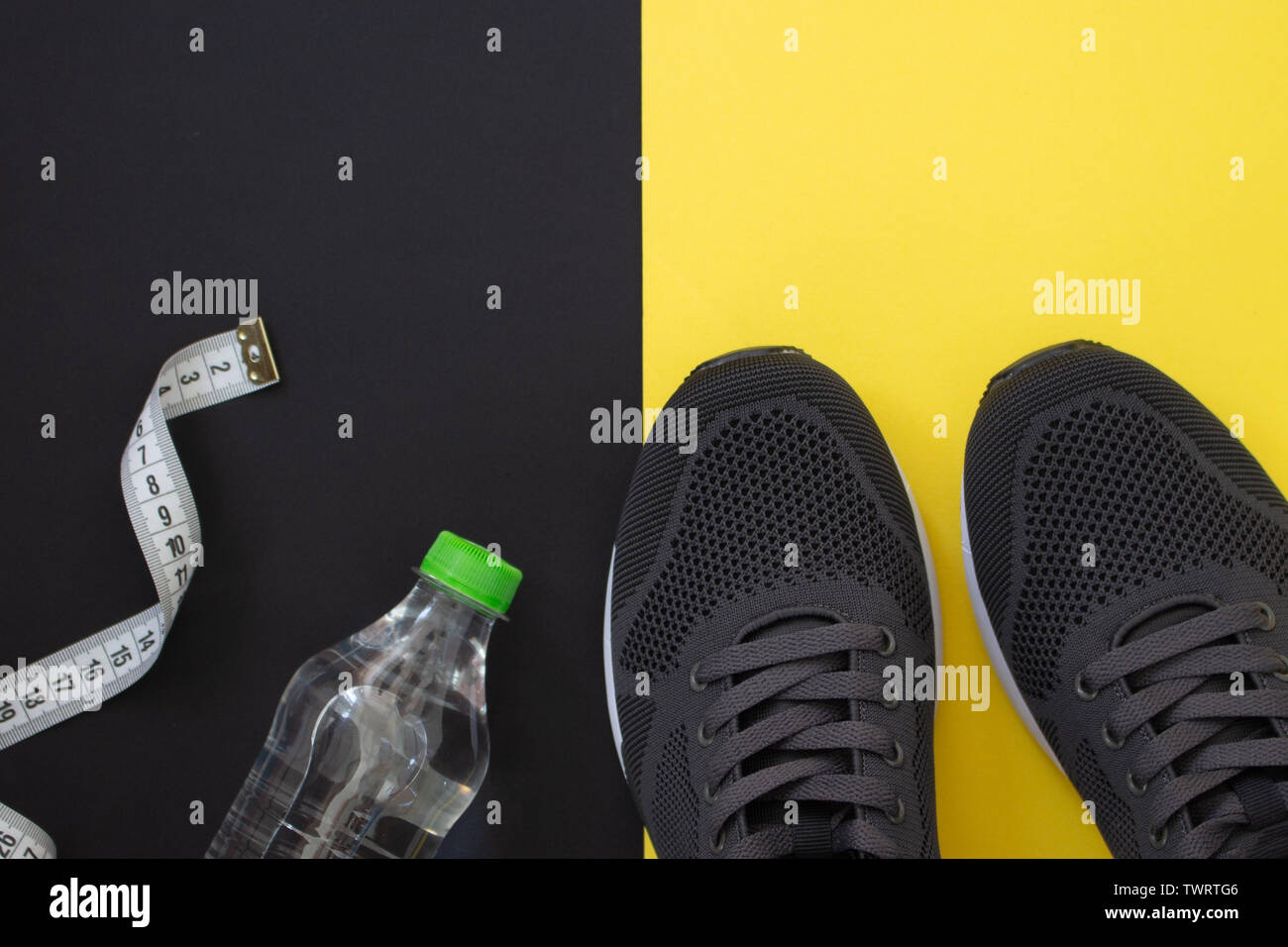 Fitness flat lay. Healthy lifestyle and sport concept. Black sneakers ...