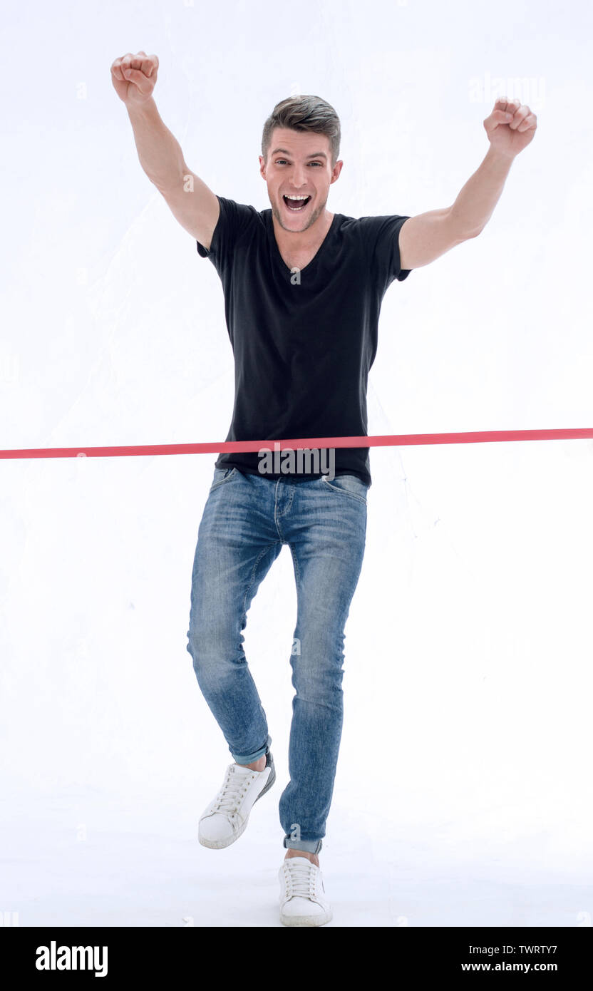 Runner crossing finishing line hi-res stock photography and images - Alamy