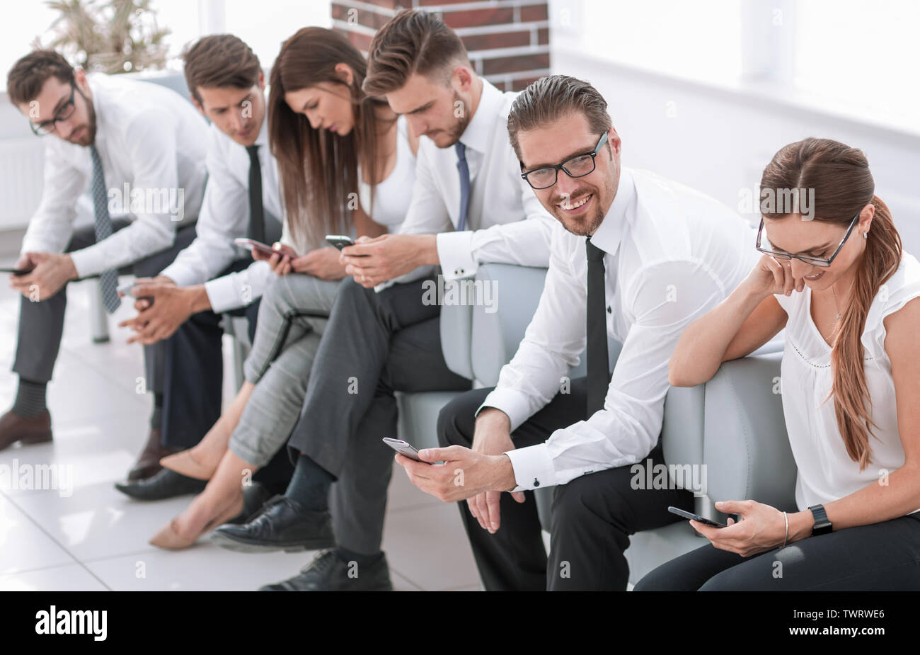 group of employees is waiting for the start of a business meeting Stock ...