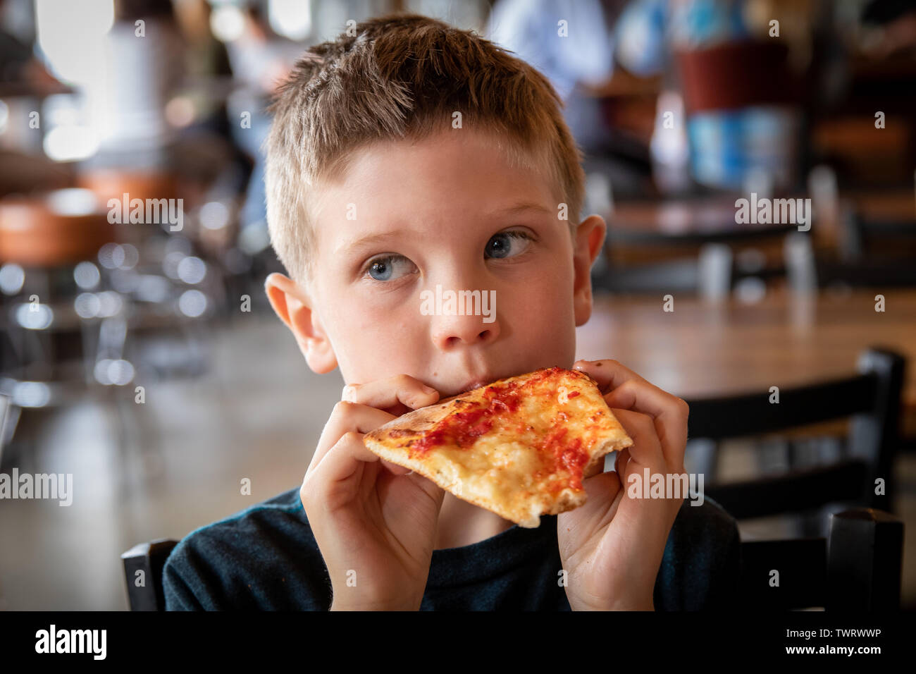 Boy playing video game Stock Photo - Alamy