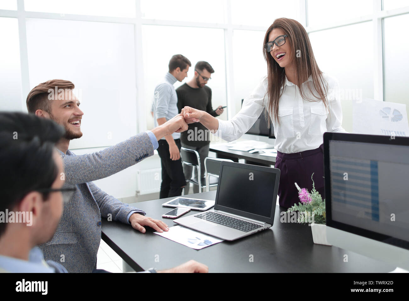 friendly colleagues in the workplace Stock Photo - Alamy